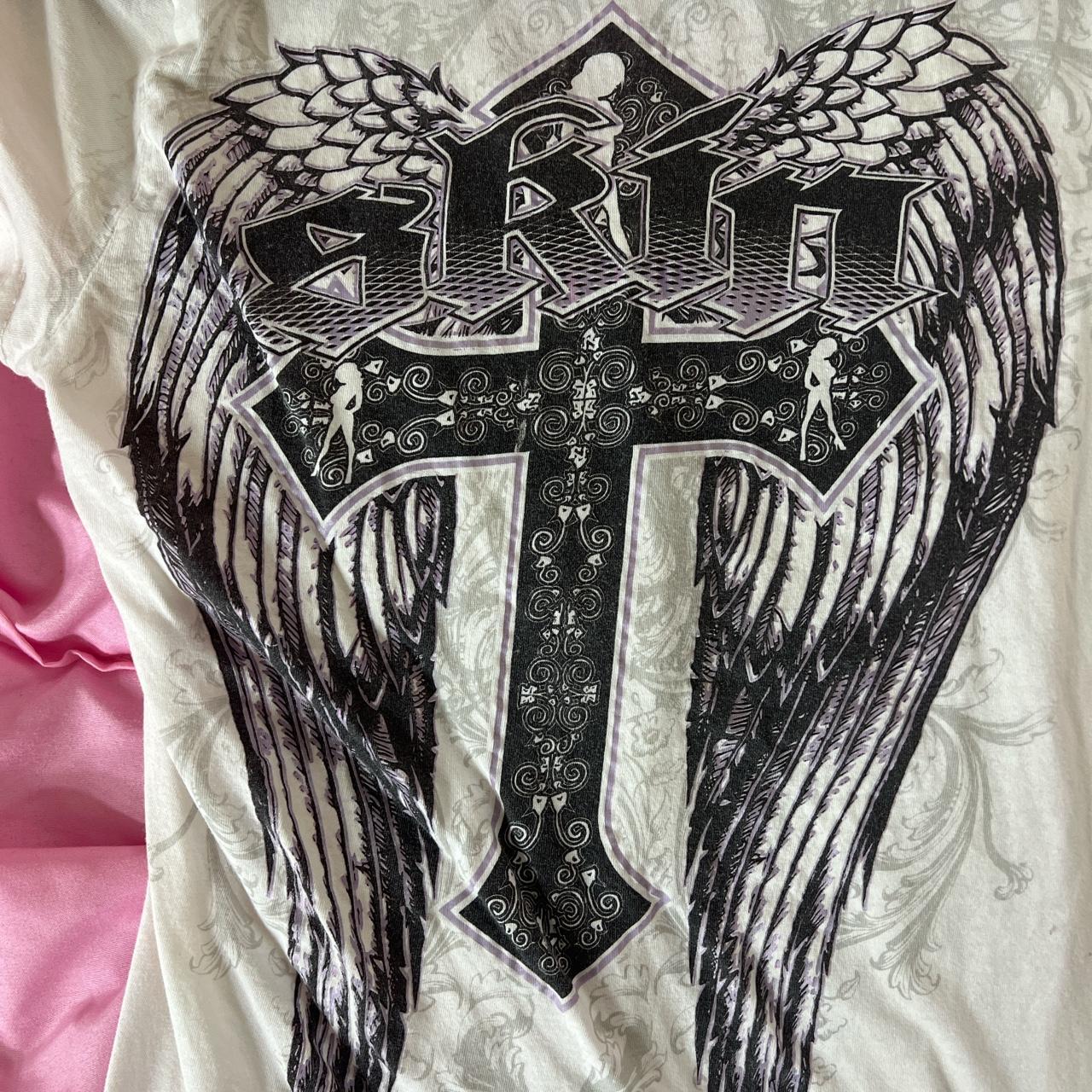 SKIN Y2K Angel Wings Cross - Depop