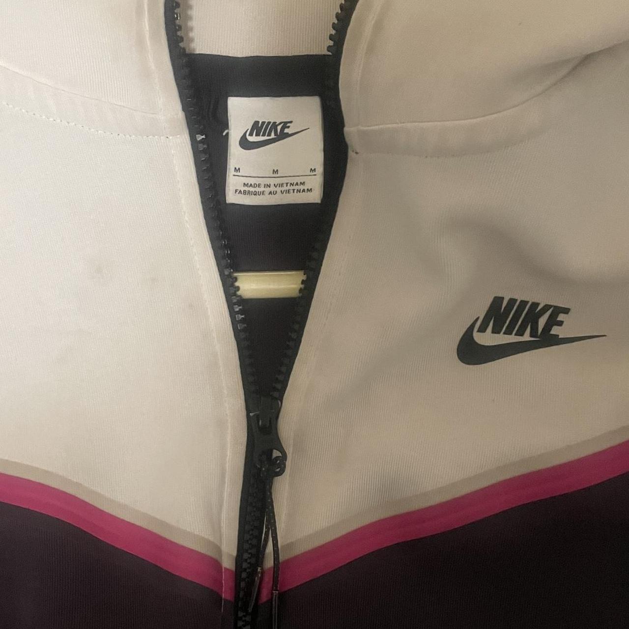 Nike tech. Magenta pink and white. A little dingy... - Depop