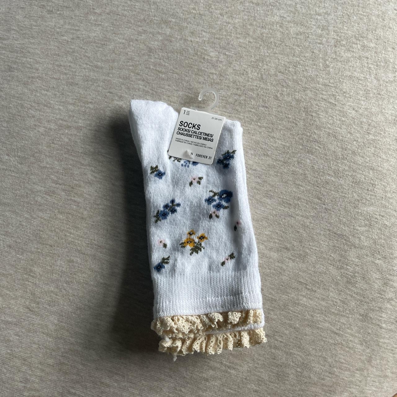NWT white floral socks with lace detail Size: One... - Depop