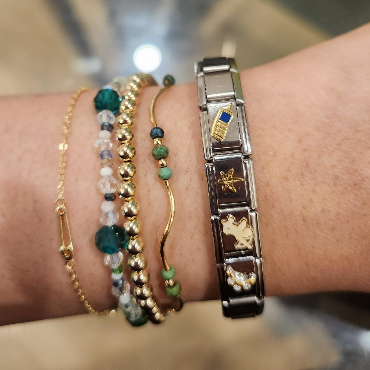 Stainless steel italian charm bracelet with 4... - Depop