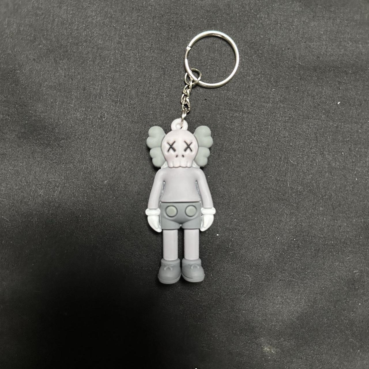 kaws keychain gray - Depop