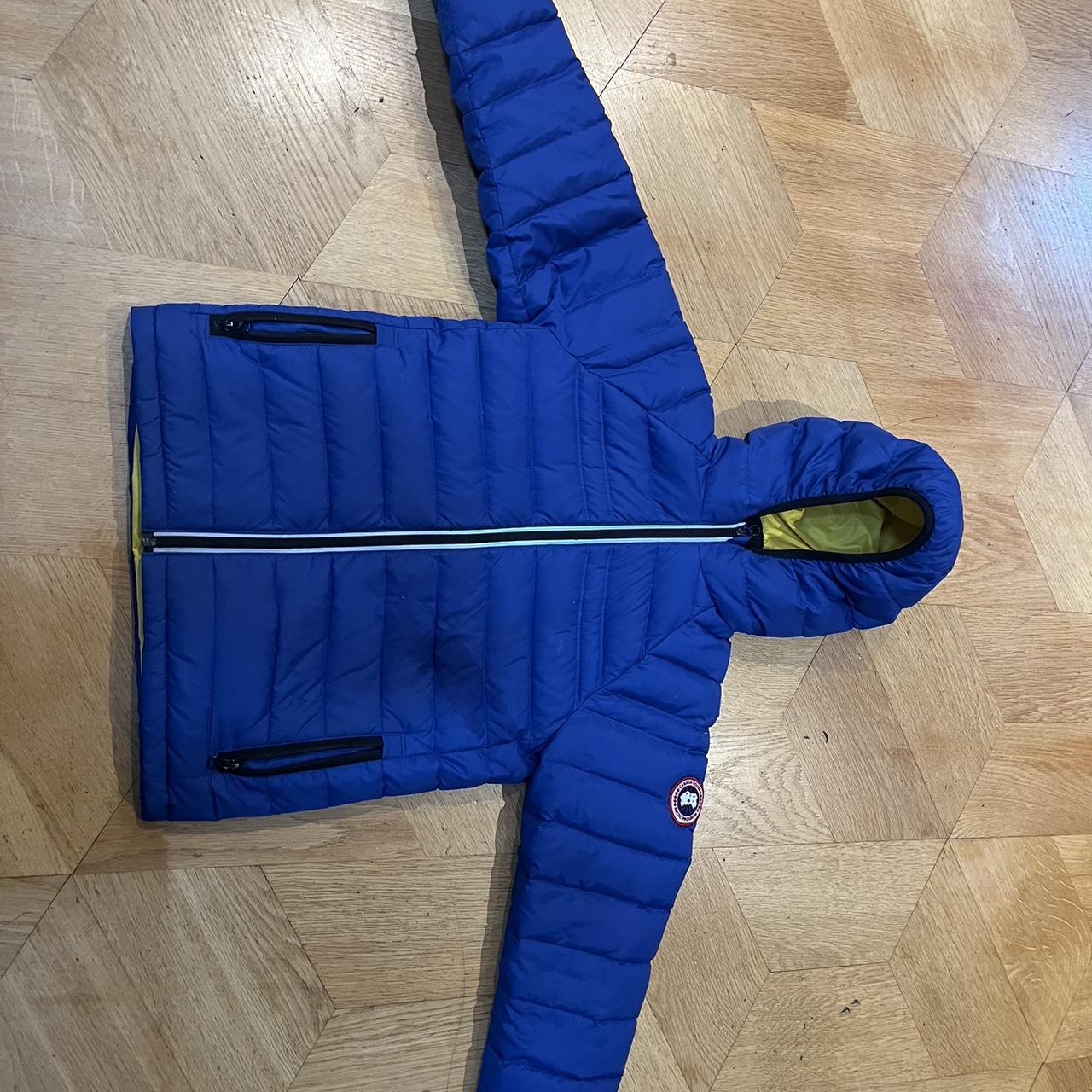 Blue Canada Goose Arctic Program coat with yellow... - Depop