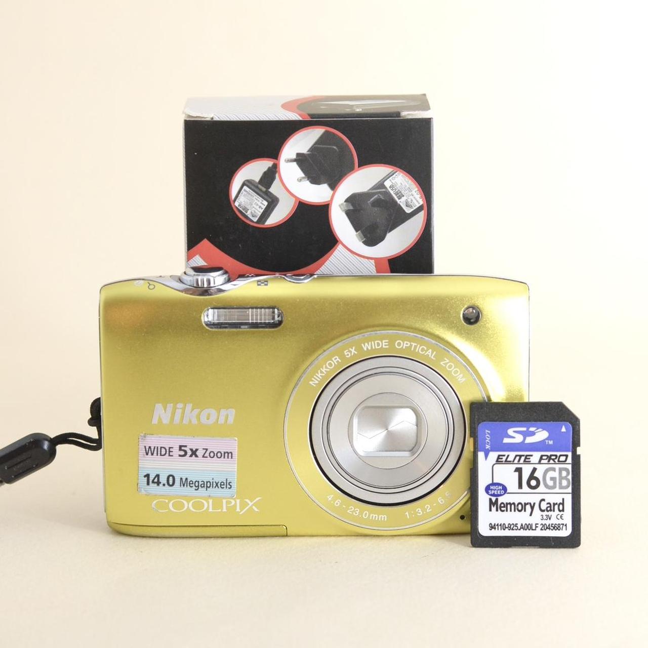 Nikon Silver and Yellow Cameras-and-accessories | Depop