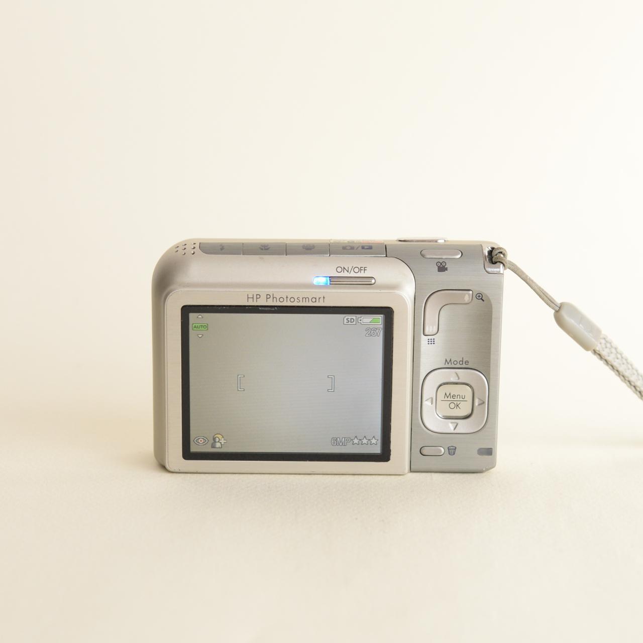 HP Photosmart R727 | 6.2MP Digital camera with a SD... - Depop