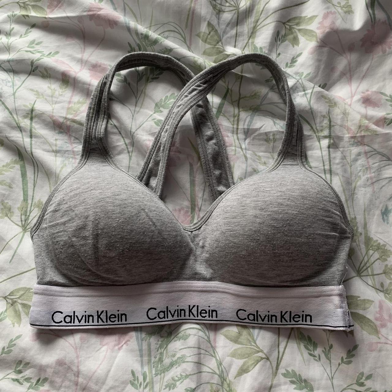 Grey Calvin Klein sports bra Lightly padded / pushup... - Depop