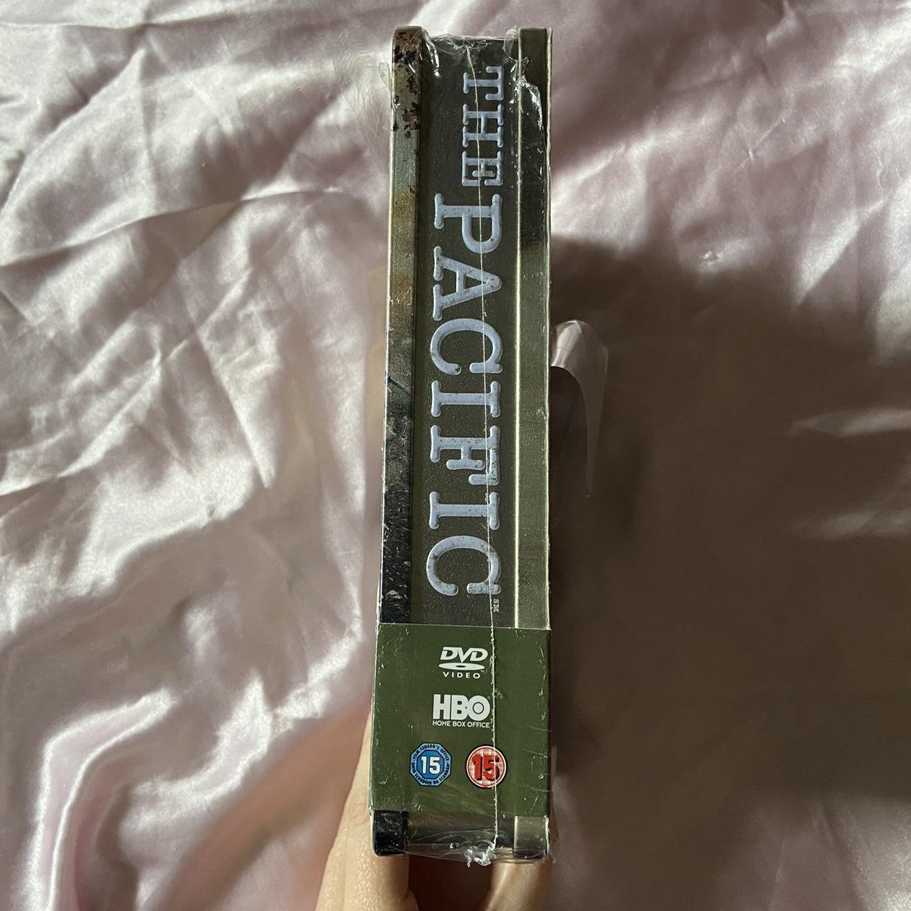 The Pacific DVD Tin Box Set still partially... - Depop