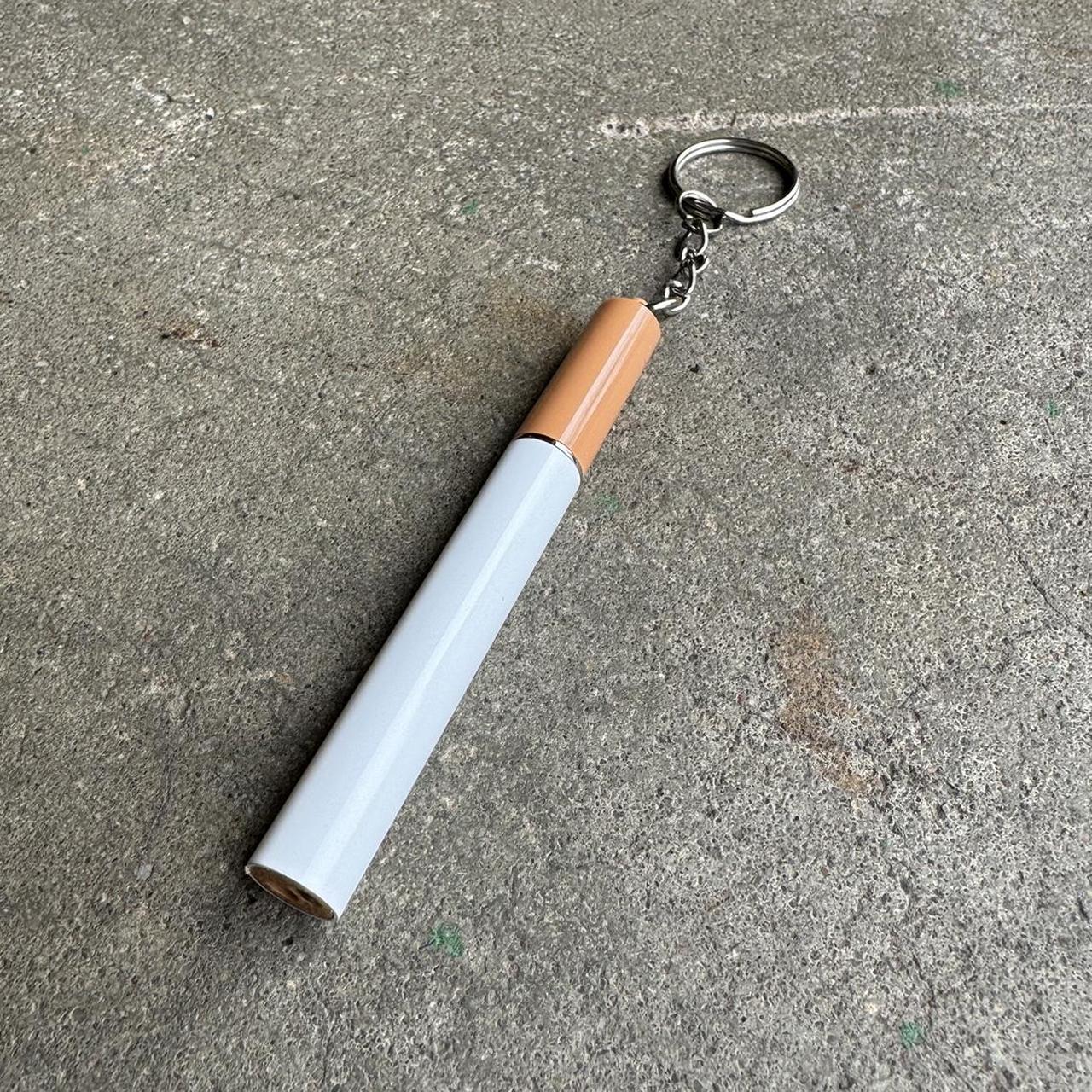 Cigarette keychain Has as a light and laser... | Depop