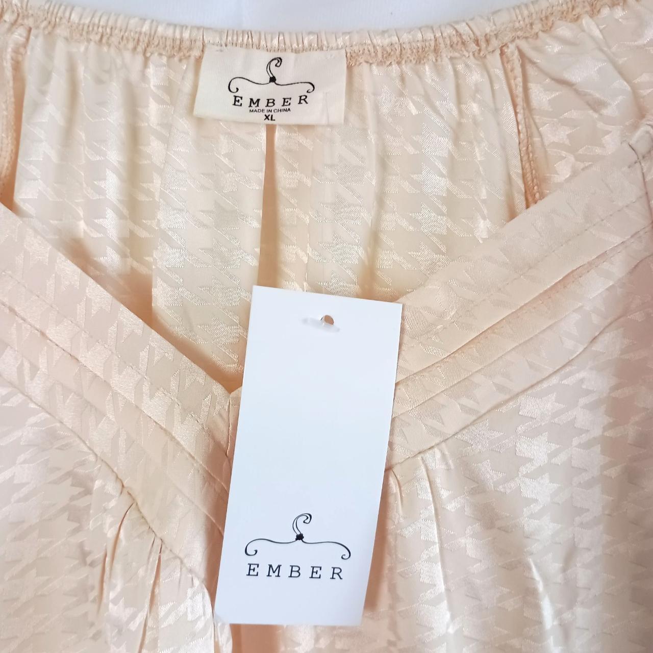 Embrace your elegance with the Ember ladies V-neck... - Depop