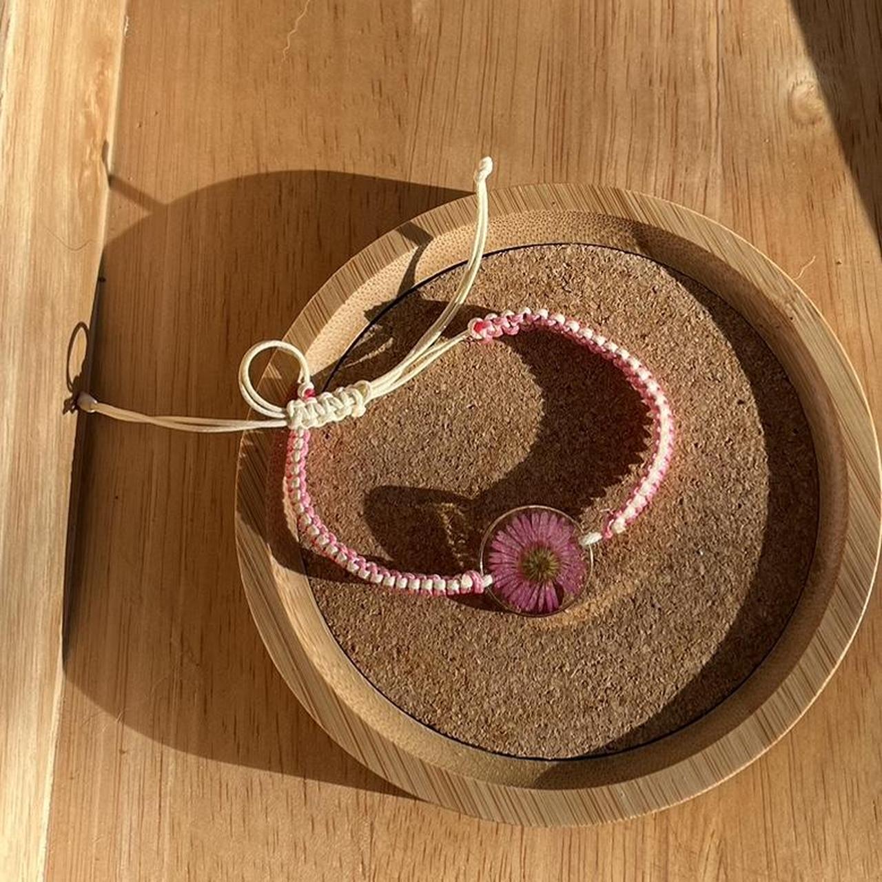 pink flower twine bracelet. super cute :) - Depop