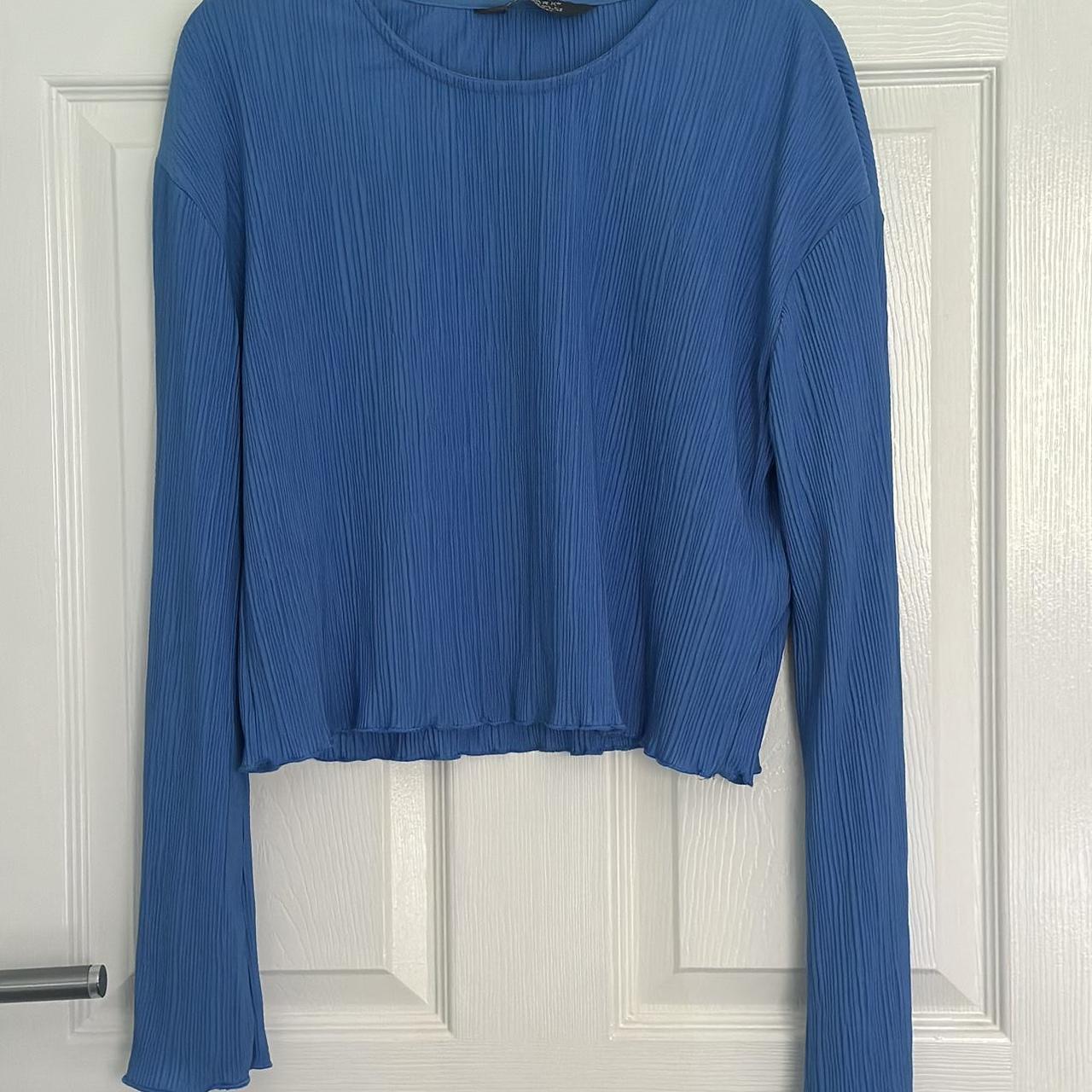 Long sleeve flared arm electric blue plisse top... - Depop