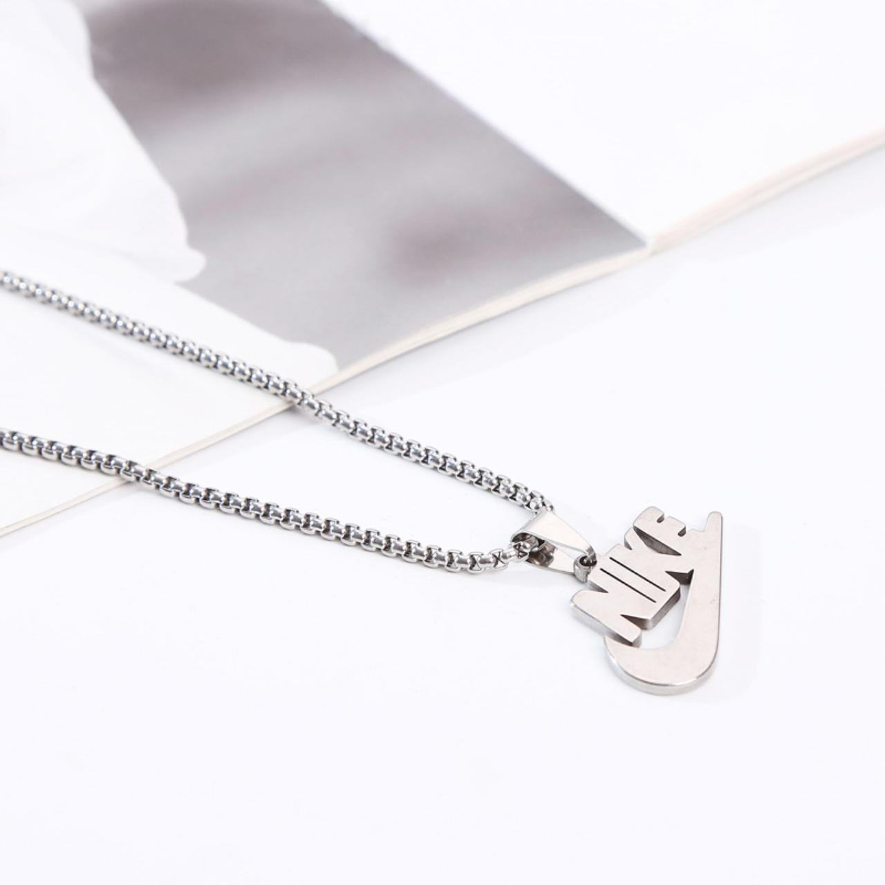 Nike Pendant Silver Necklace Unisex Wear - Depop