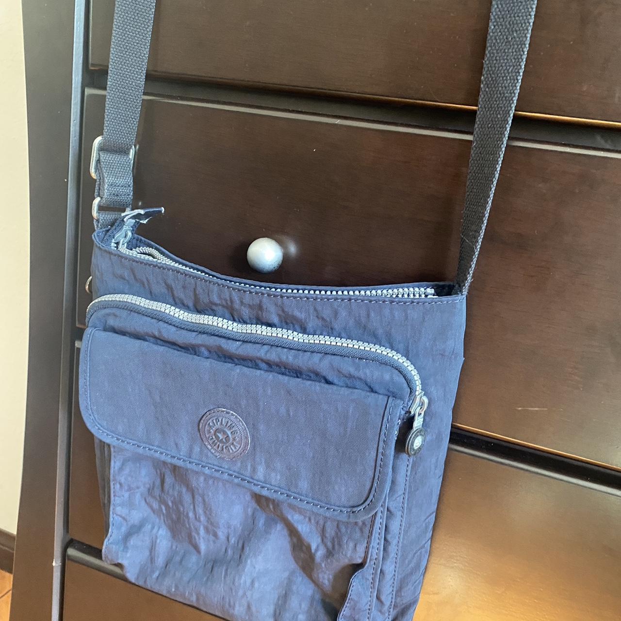 Navy Blue Kipling Crossbody bag. For size reference,... - Depop