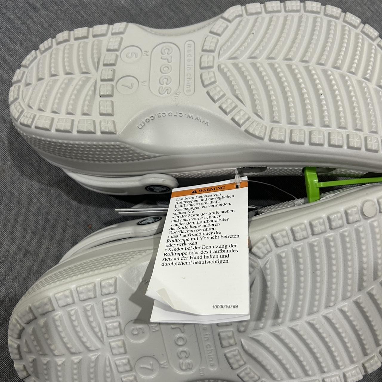 Grey/earth crocs brand new Size on shoe Negotiable... | Depop