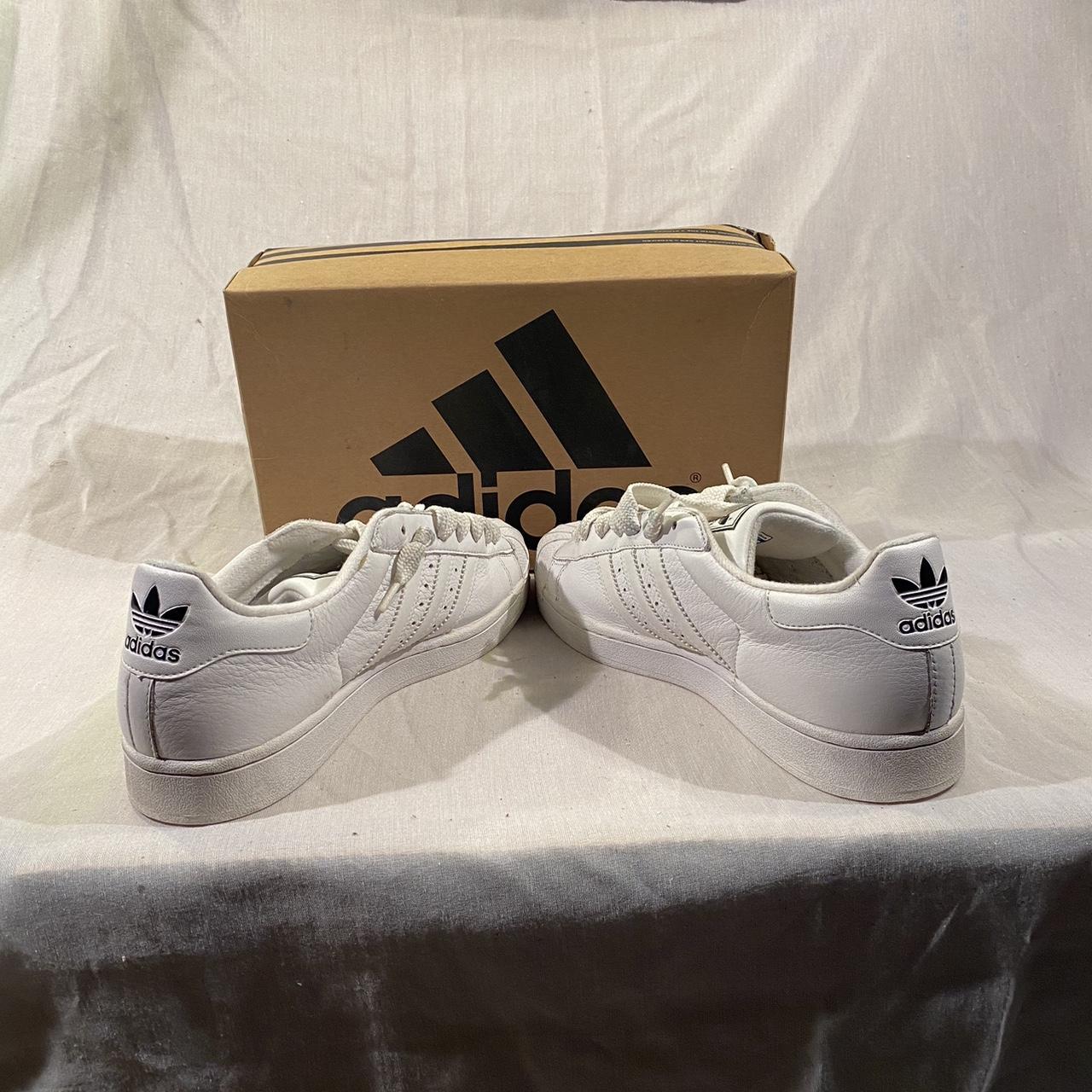 All white shell toes, worn a few times, with box.... - Depop