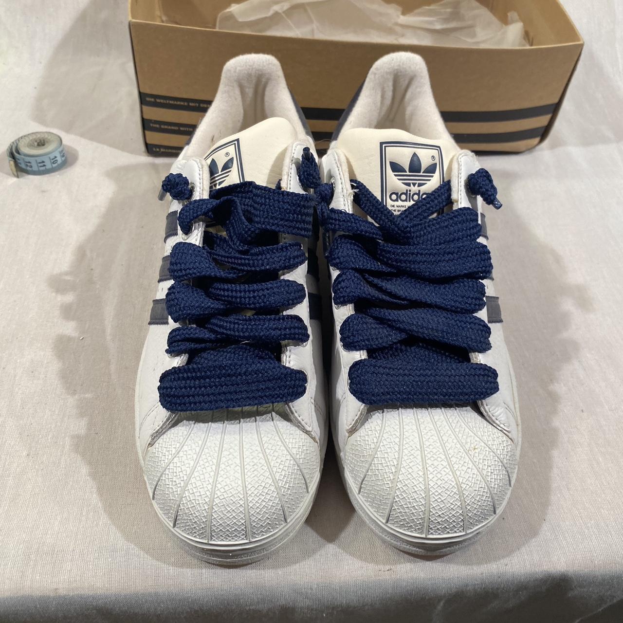 Worn twice metallic navy blue shell toes. #adidas... - Depop