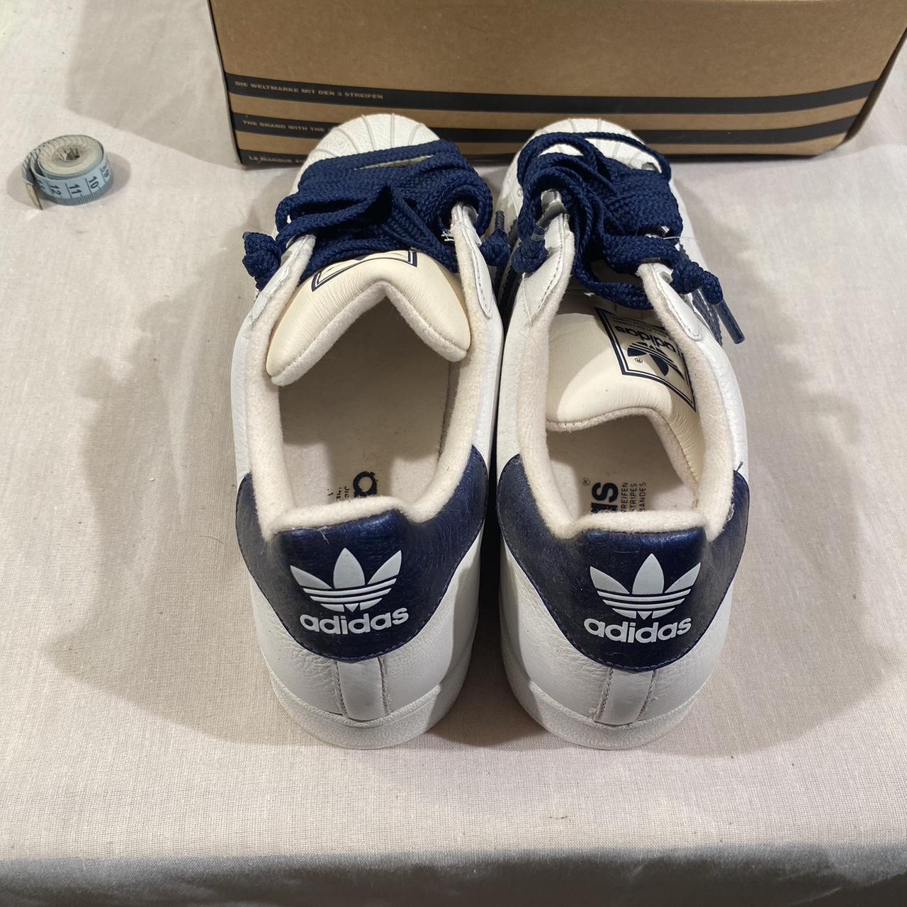 Worn twice metallic navy blue shell toes. #adidas... - Depop