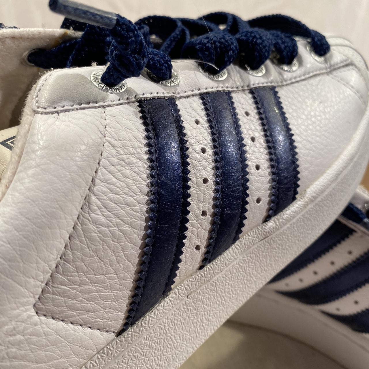 Worn twice metallic navy blue shell toes. #adidas... - Depop