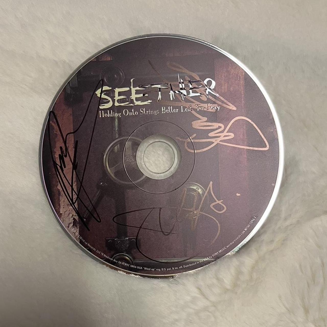 RARE seether SIGNED CD Holding Onto Stings Better... | Depop