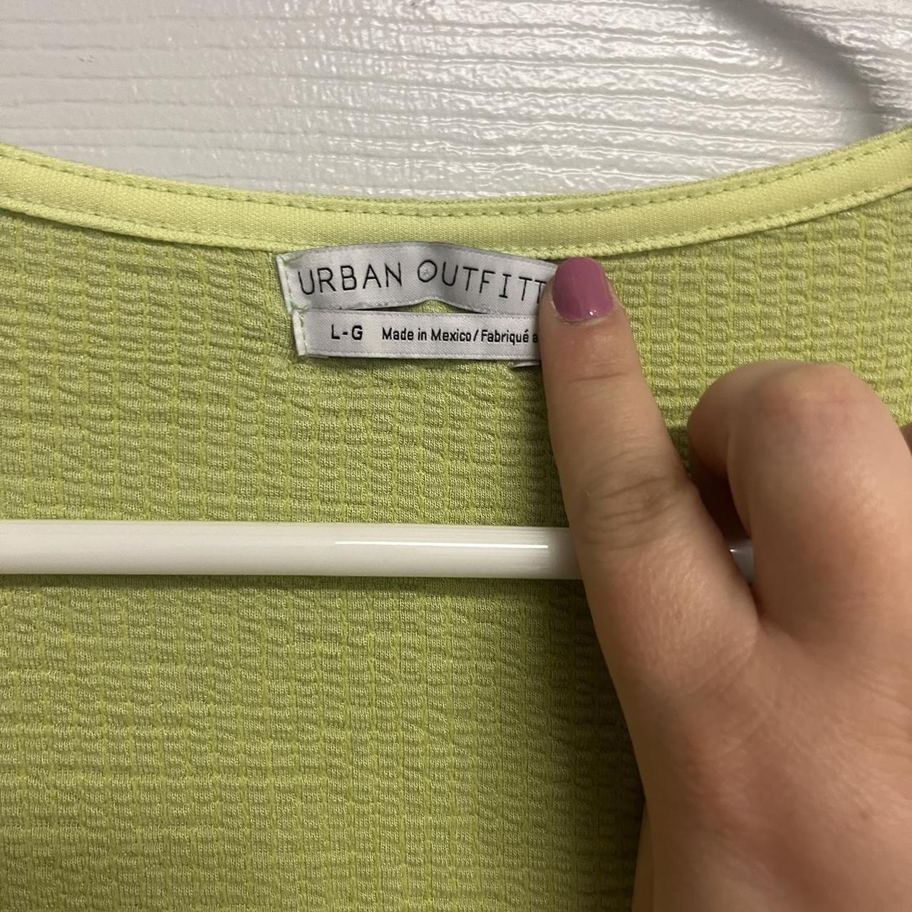 Green going-out top. The long ties on the side can... - Depop