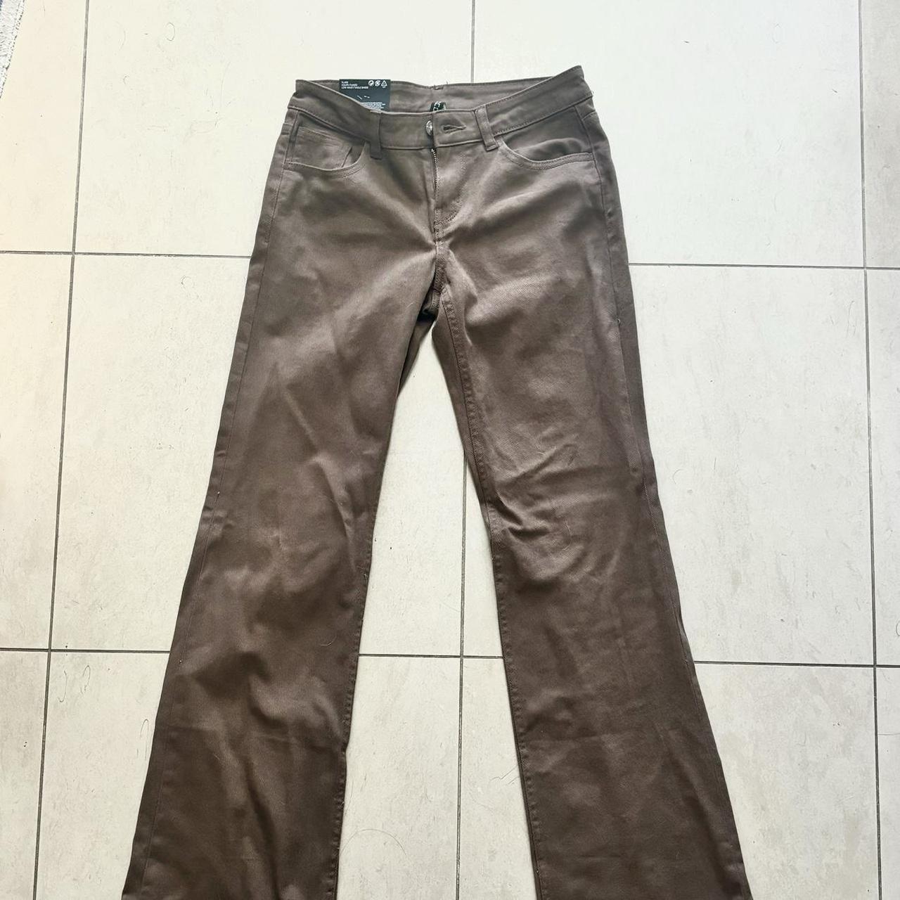 low rise brown flare jeans divided size 4, new with... - Depop