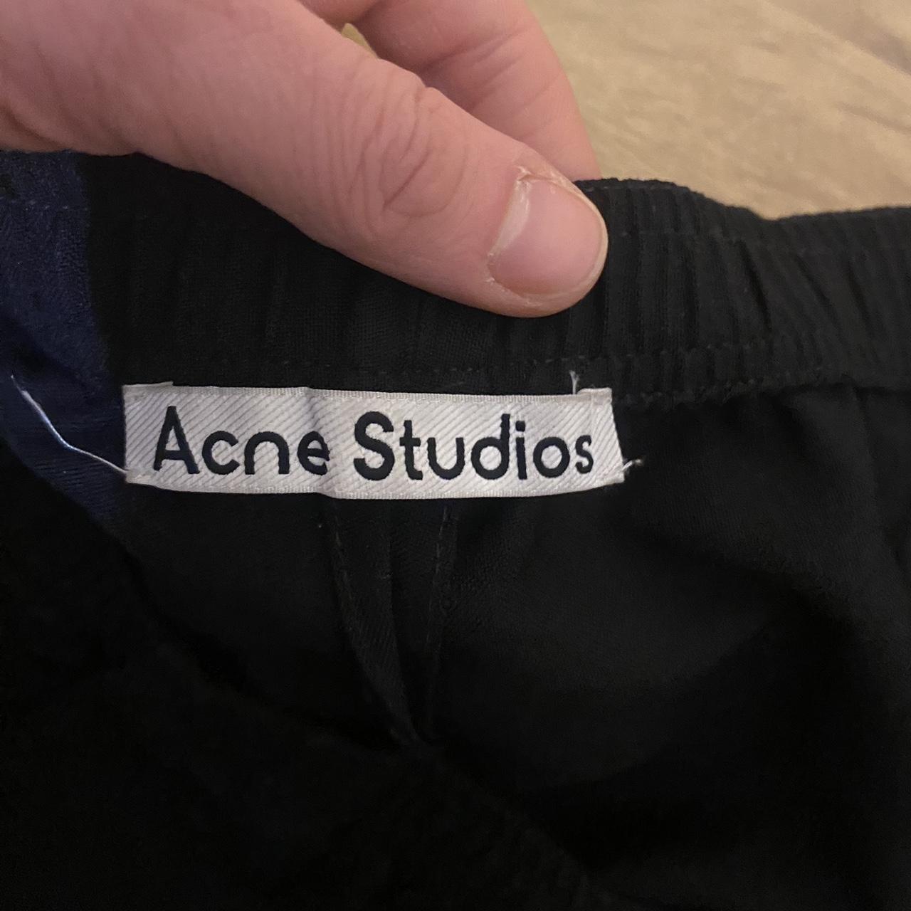 Acne studios Black wool track pants with elasticated... | Depop