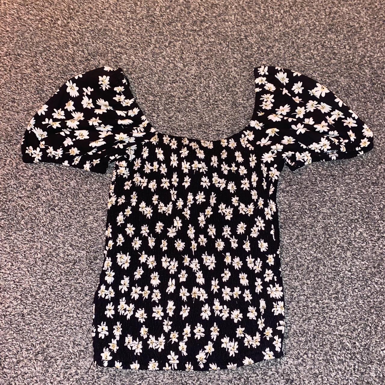 Small Black off the shoulder flower pattern top.... - Depop