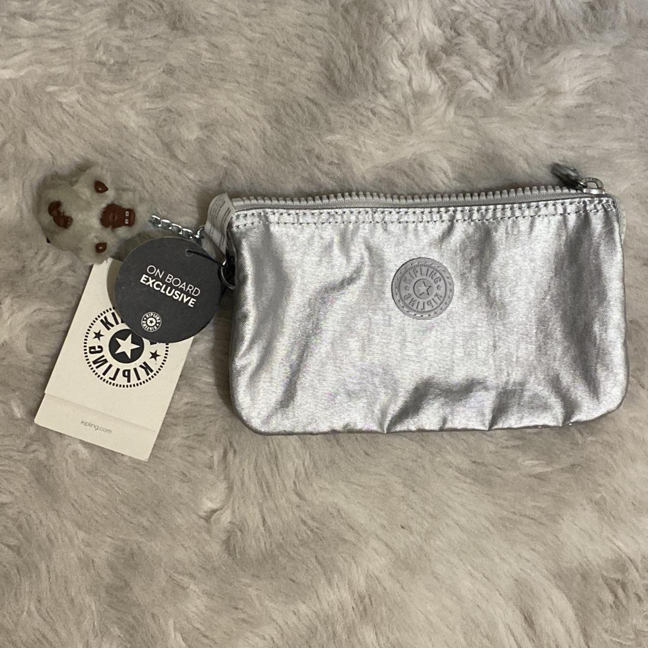 Silver Kipling little zip wallet bag with tags super... - Depop