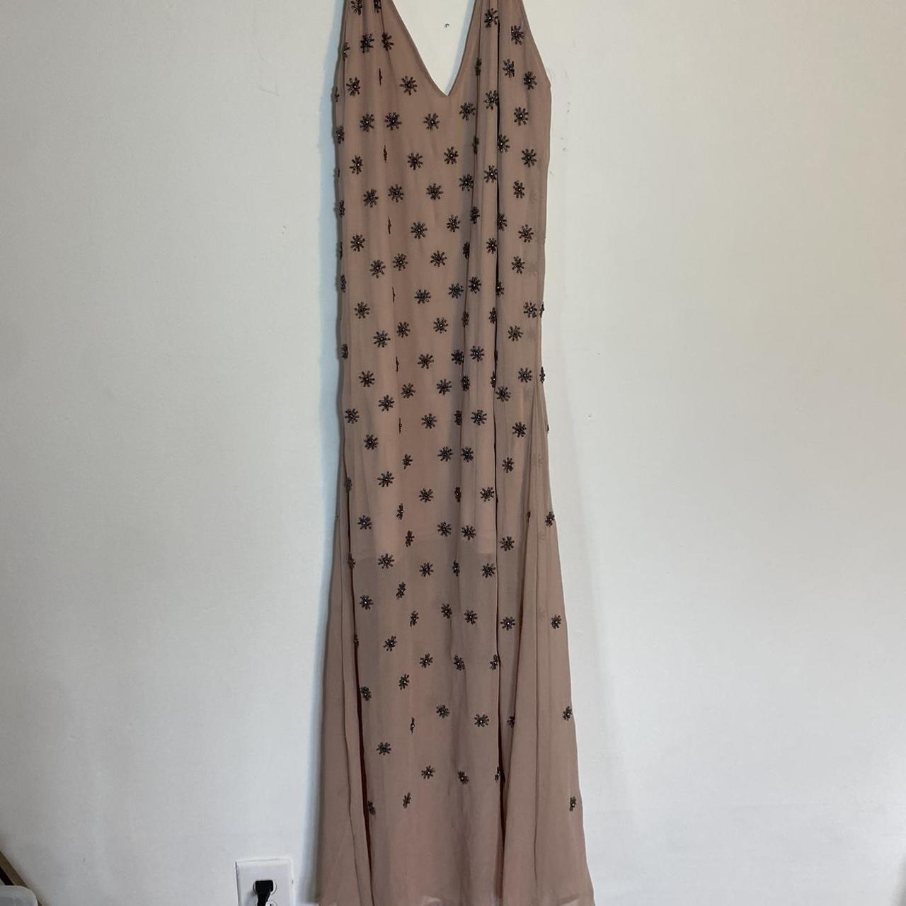 Maxi embellished deep v dress - by the brand Raga,... - Depop