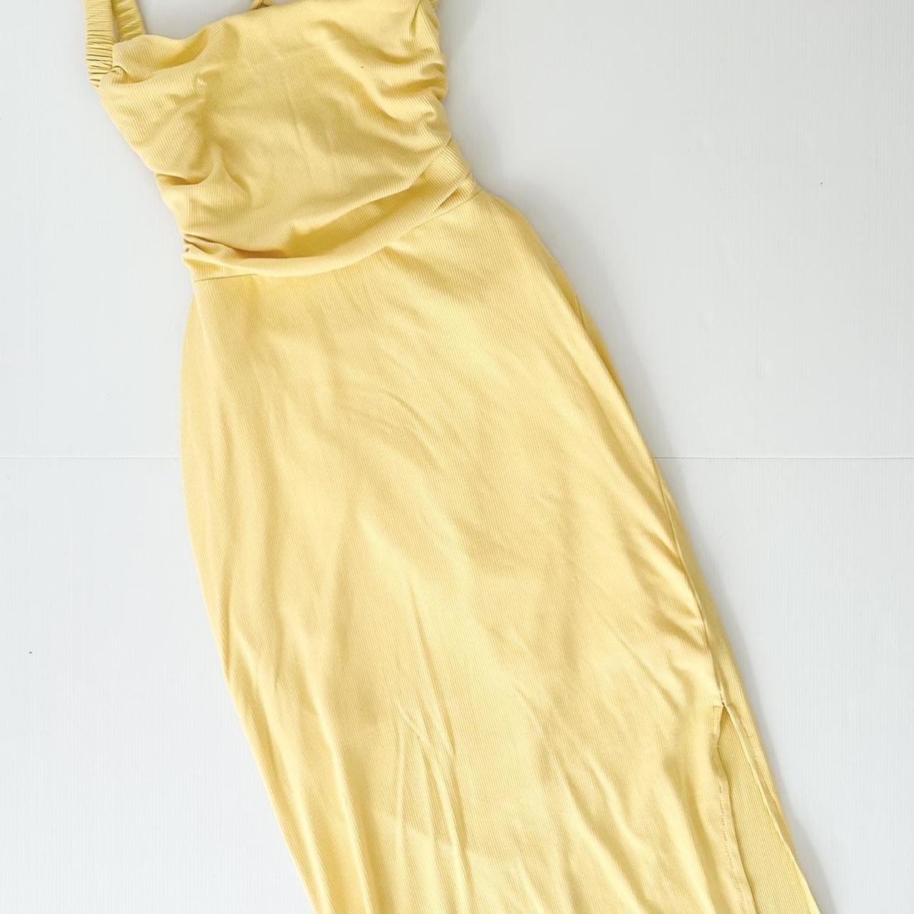 Yellow maxi dress crisscross open back with side... - Depop