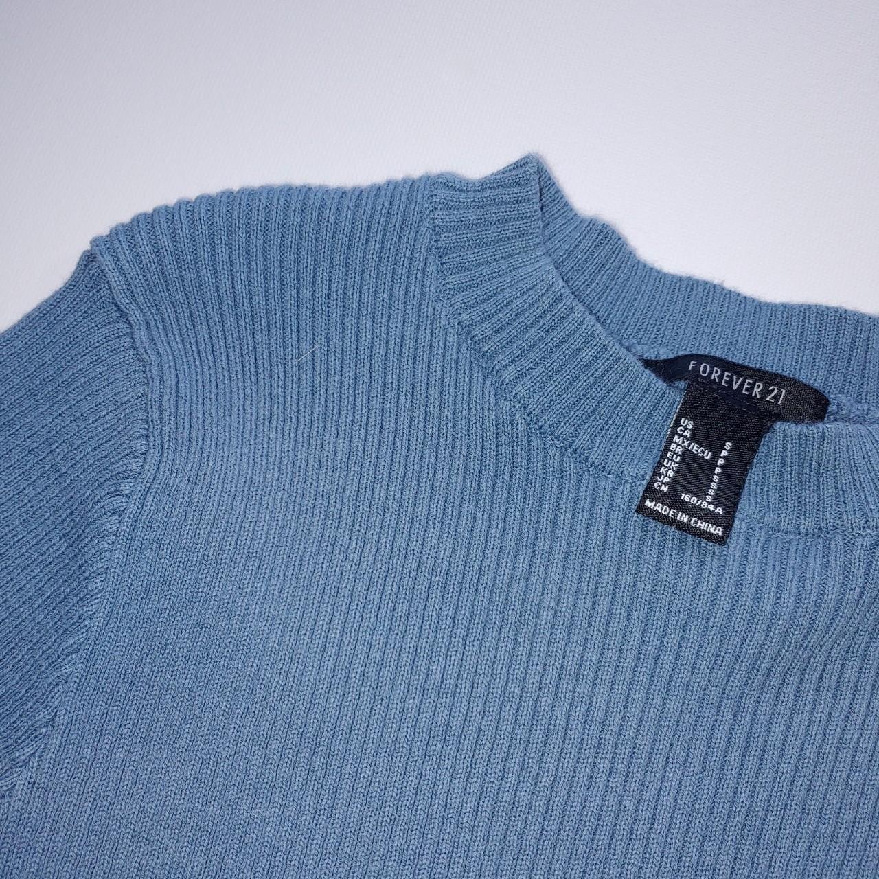 Blue kinda sky blue shirt with a stretchy material... - Depop