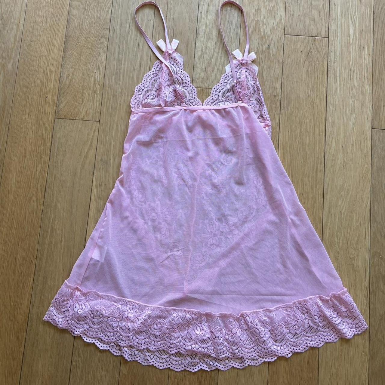 Beautiful pink slip with lace details along the... - Depop