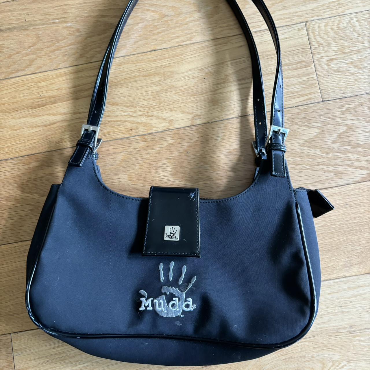 Mudd small handbag with some minor scuffing along... - Depop