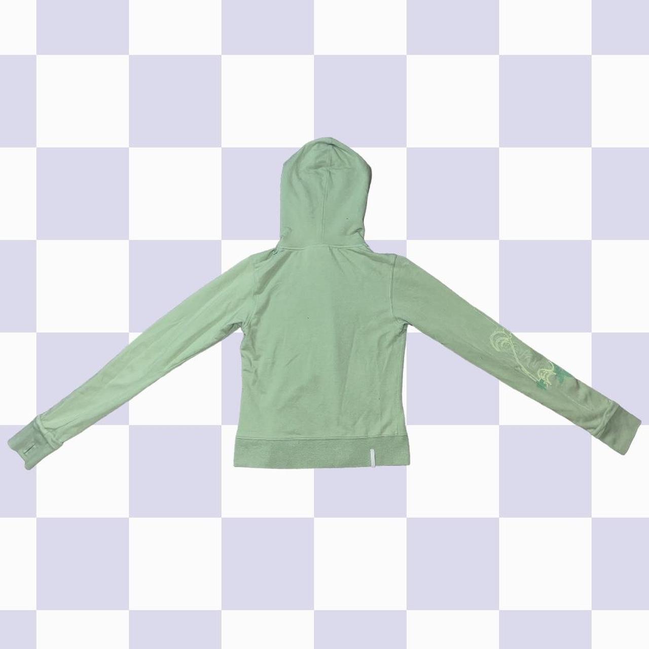 light green bench zip up with cute graphics on... - Depop