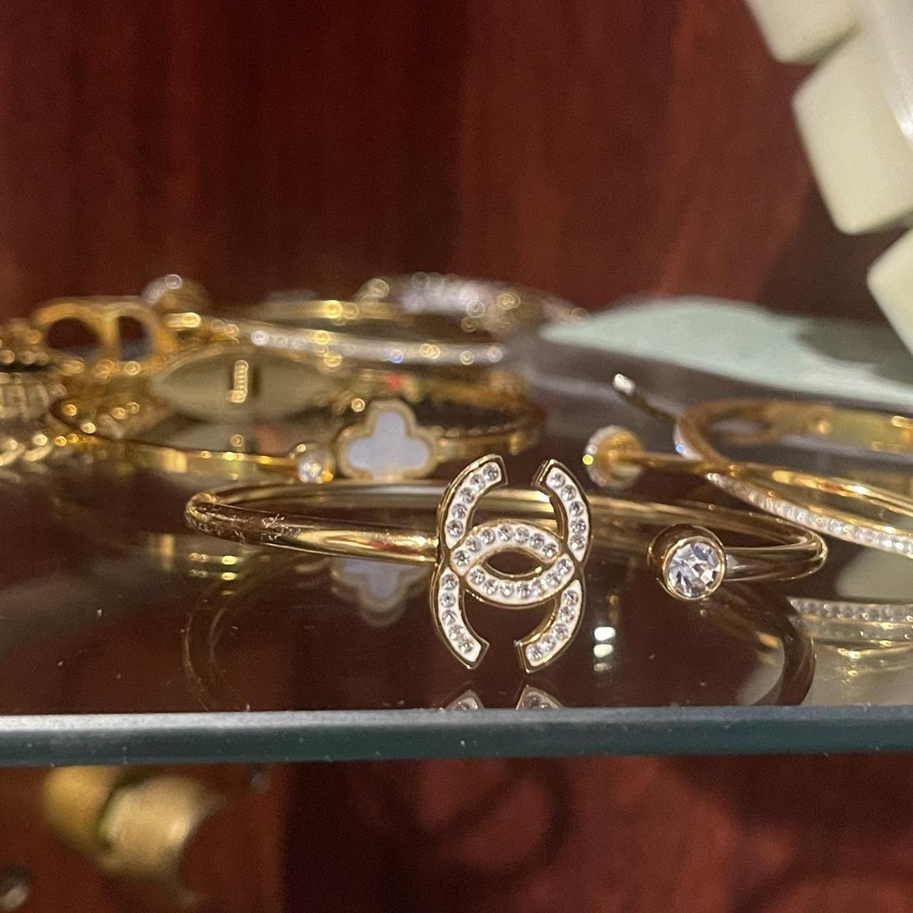 Gold Chanel bangle - Depop