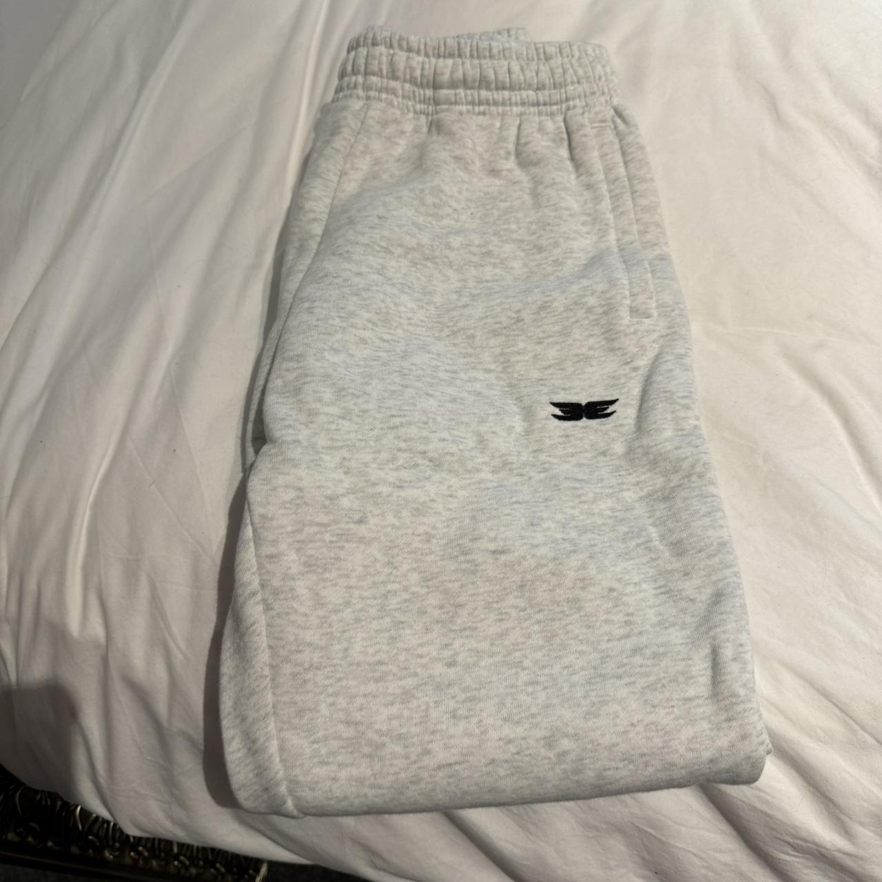 Elite Eleven polar grey trackies, small - Depop