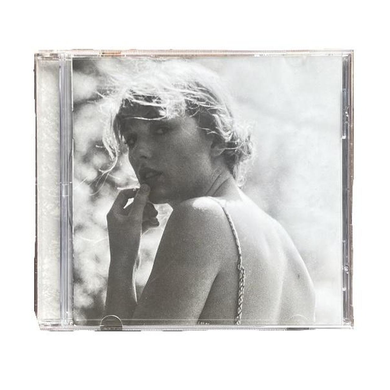 taylor swift target exclusive folklore cd with... - Depop