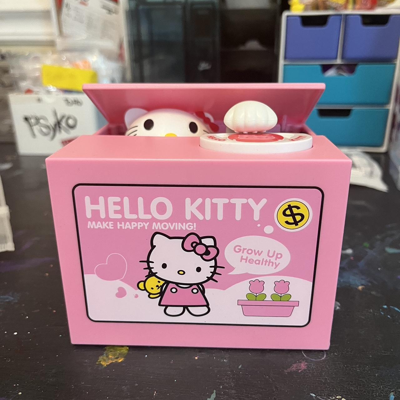 Super cute hello kitty stealing change bank. #y2k... - Depop