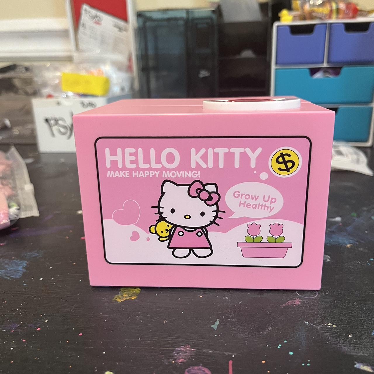 Super cute hello kitty stealing change bank. #y2k... - Depop