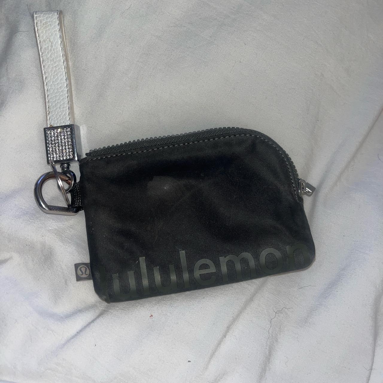 lulu wallet. super cute and fits perfect for money... - Depop