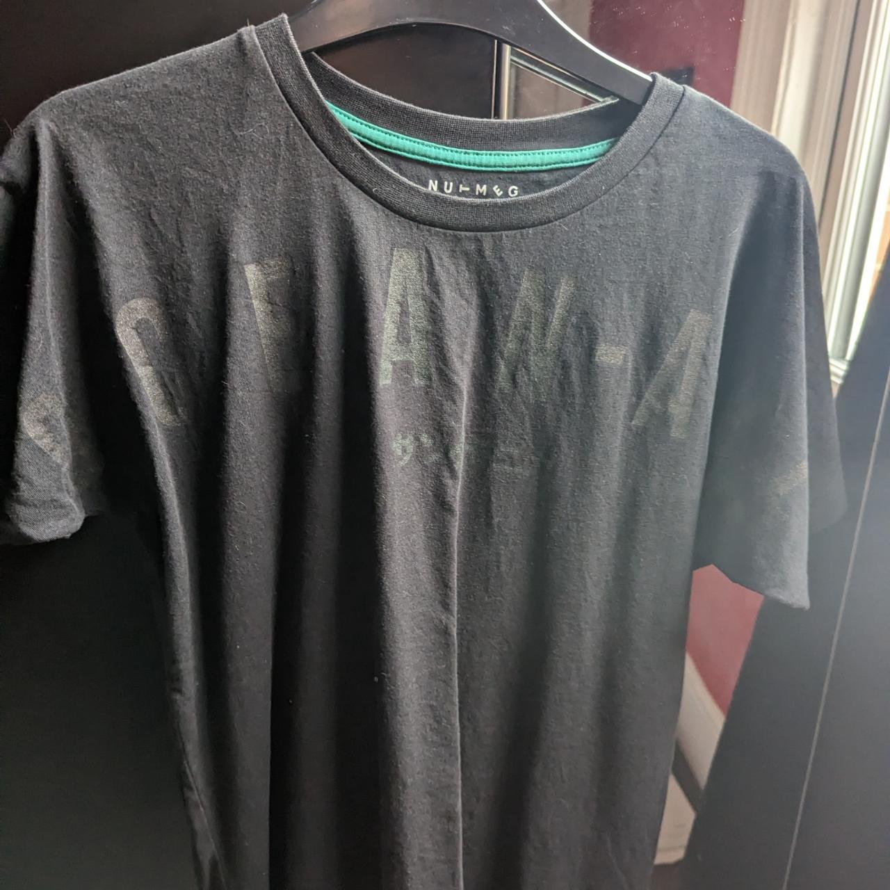 black t shirt, says ocean-ave, nutmeg brand, 13-14... - Depop
