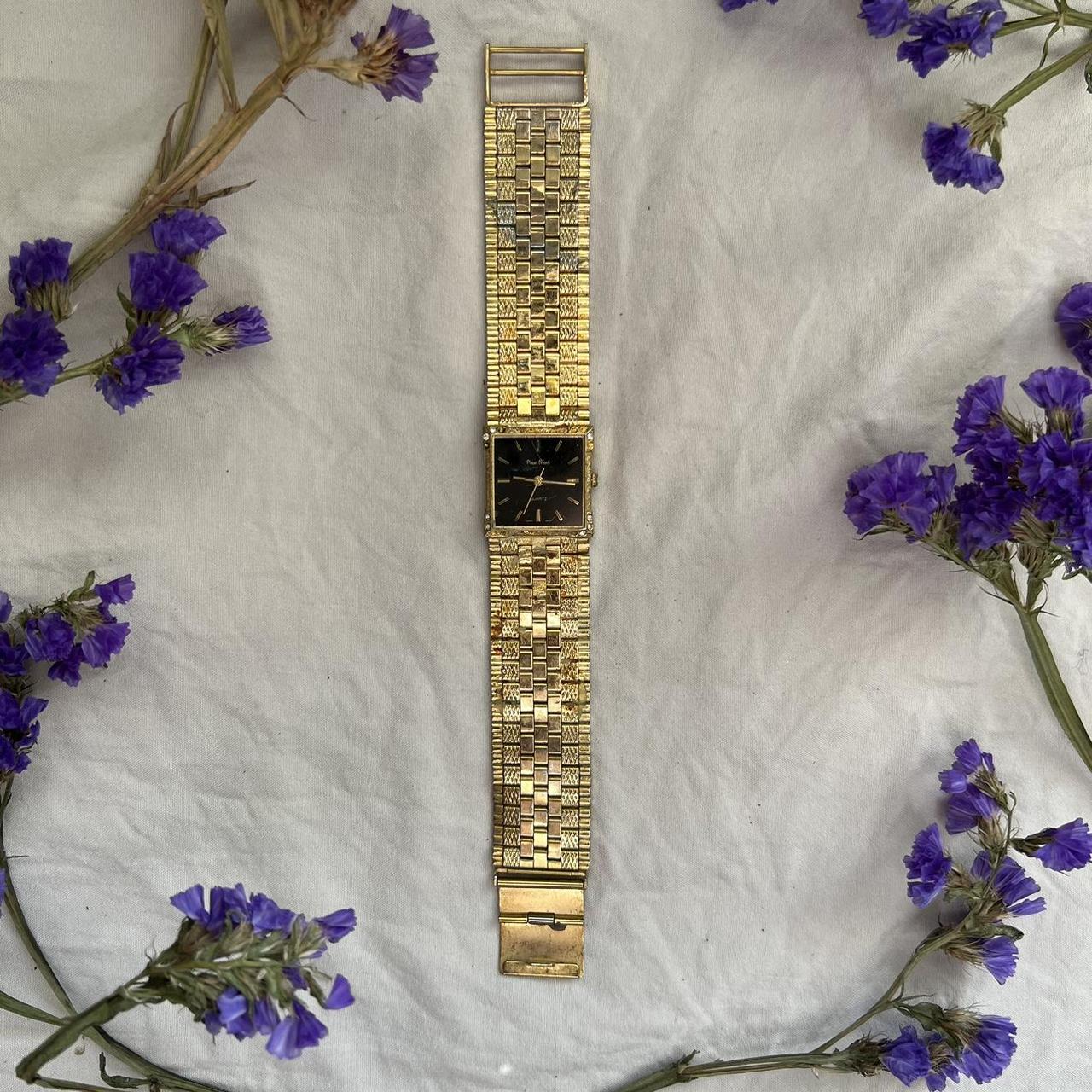 Vintage gold tone watch with black face detailing.... - Depop