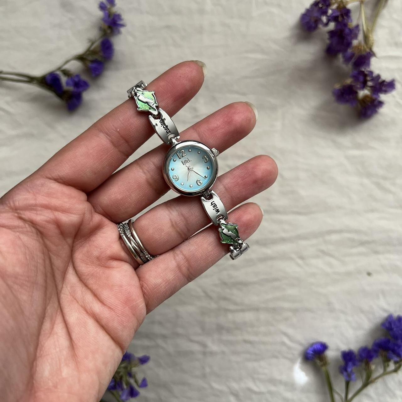 Vintage silver tone watch with blue face detail... - Depop