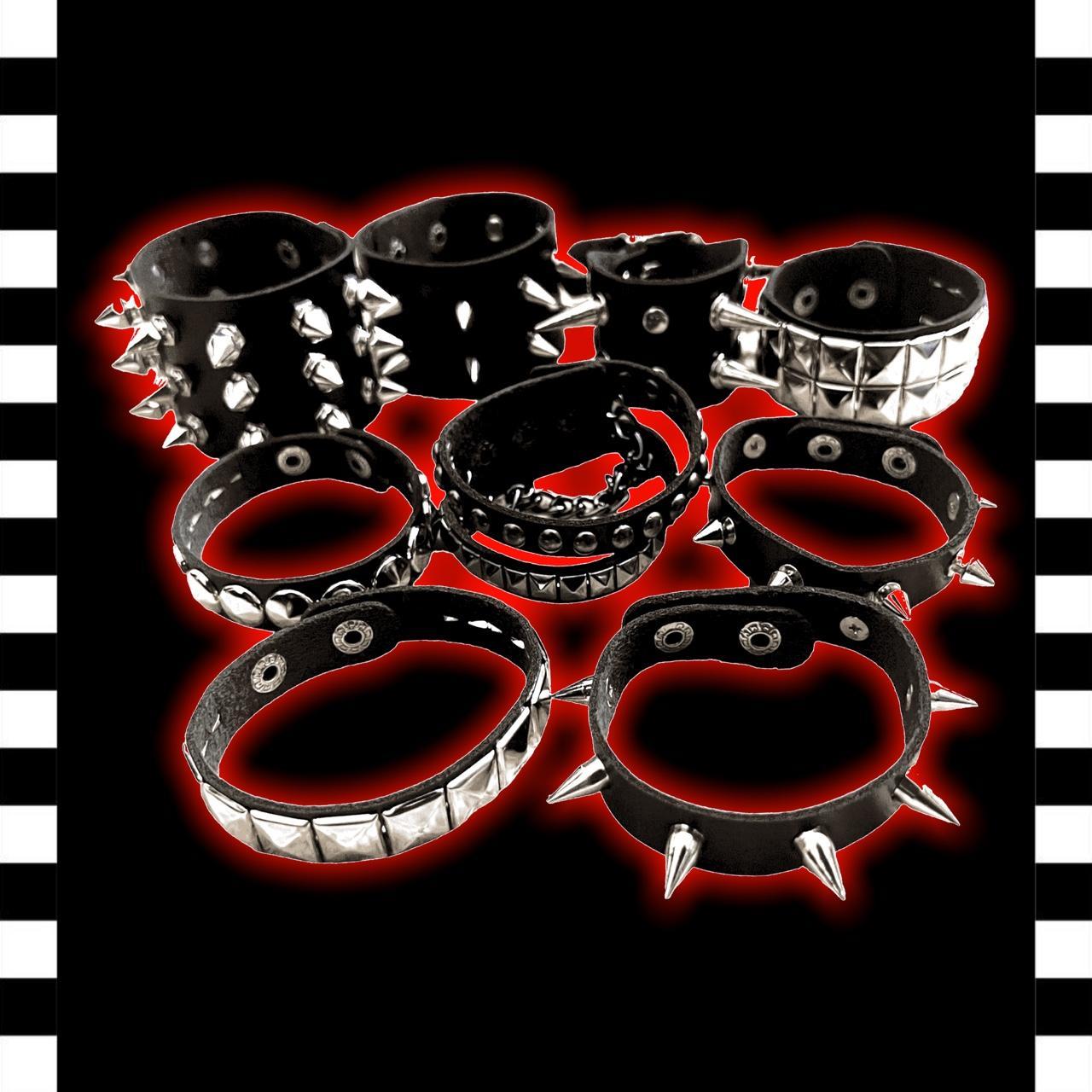 Assorted Studded and Spiked Leather Cuffs and... - Depop
