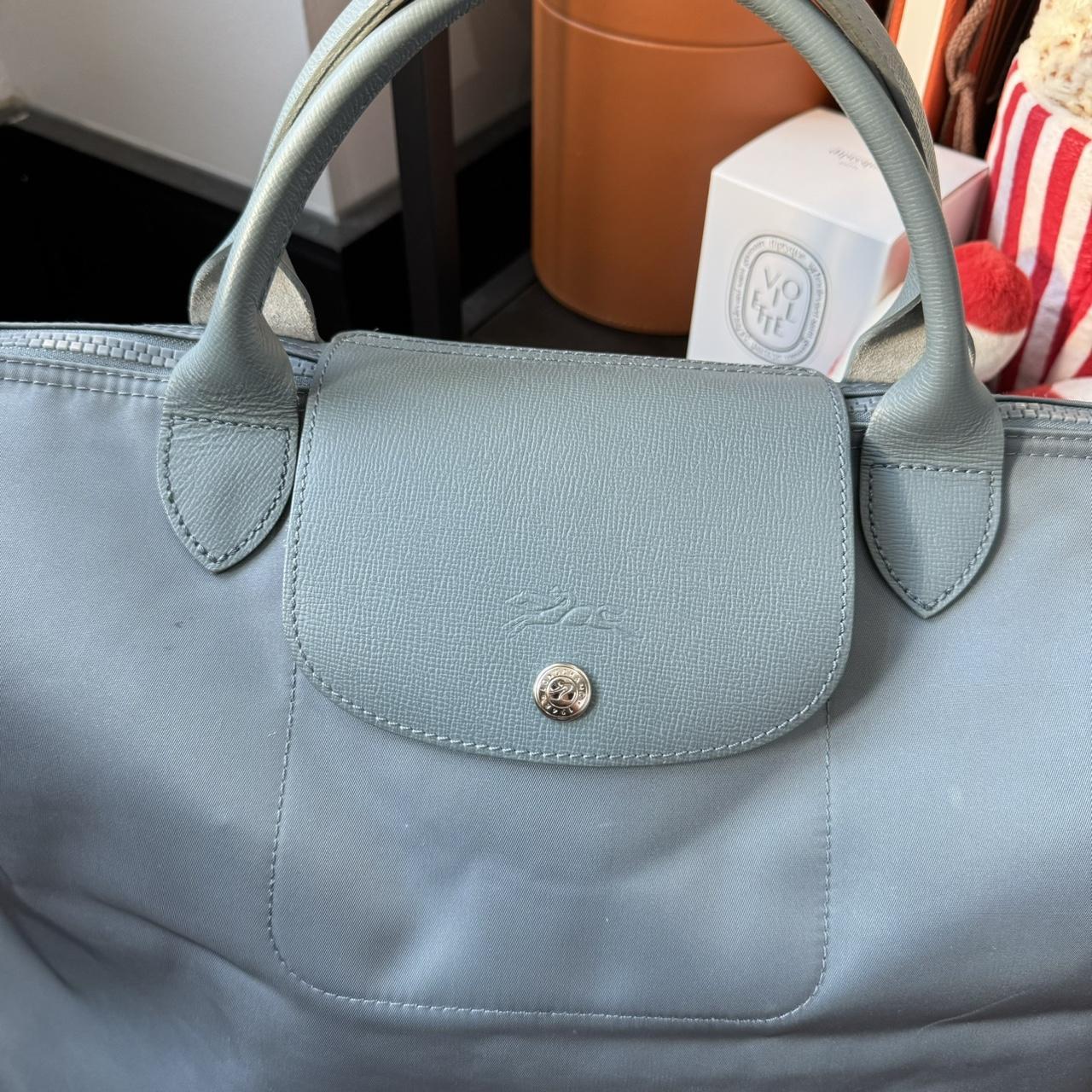 Long champ carry on bag in light blue with silver... - Depop