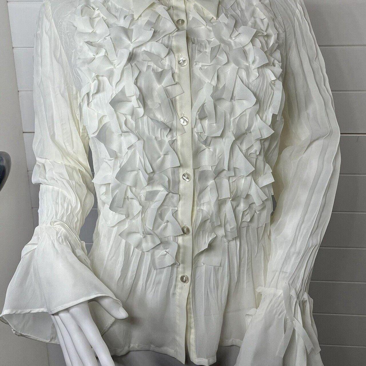 This Notations Clothing Co blouse is a classic... - Depop