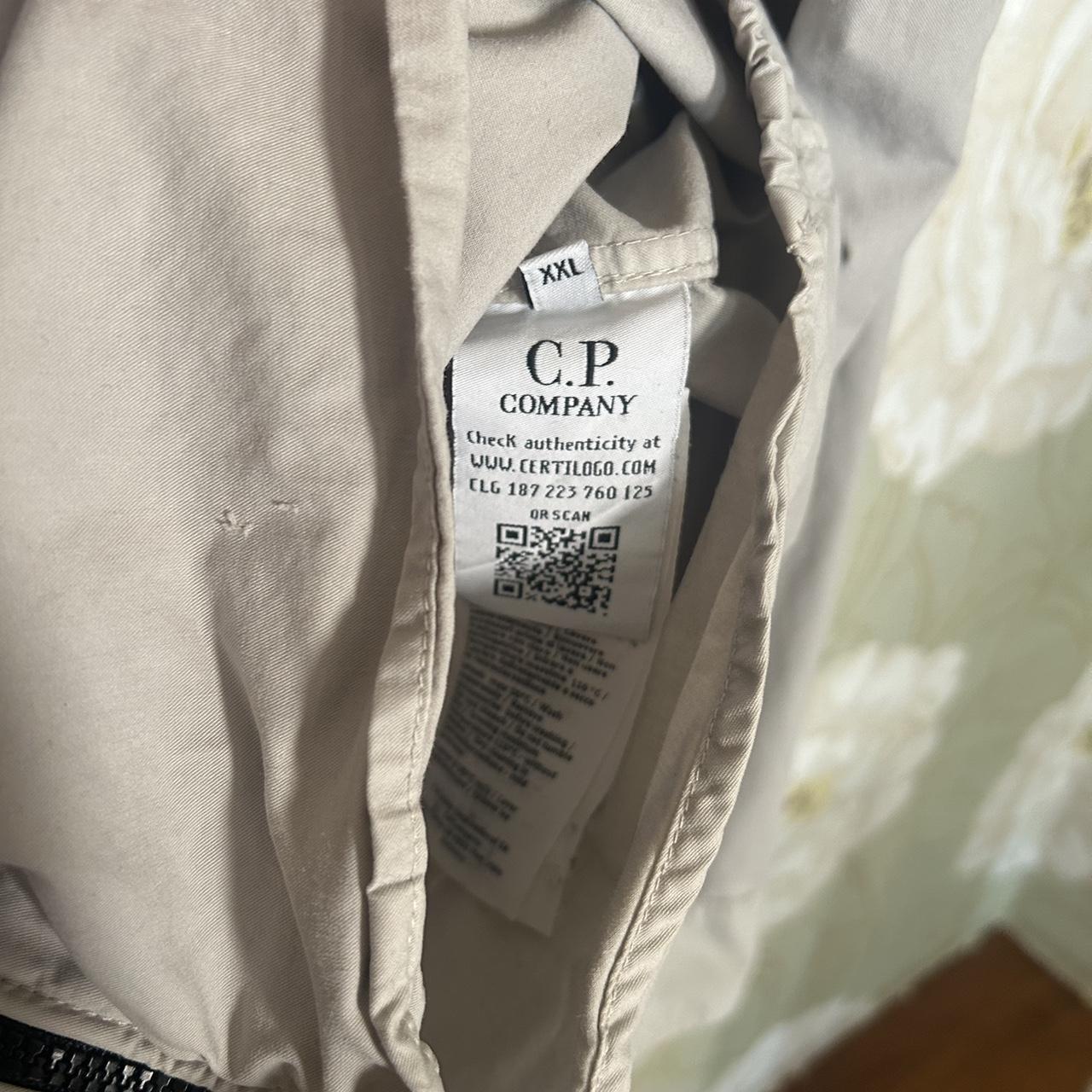 🚨 DAMAGED 🚨 CP Company jacket with damage shown on... - Depop