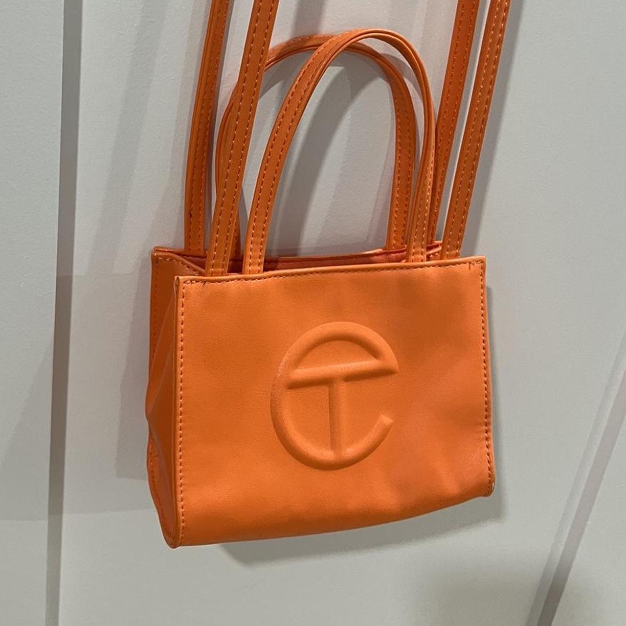 Orange small telfar. I don’t use it so I’m ready to... - Depop