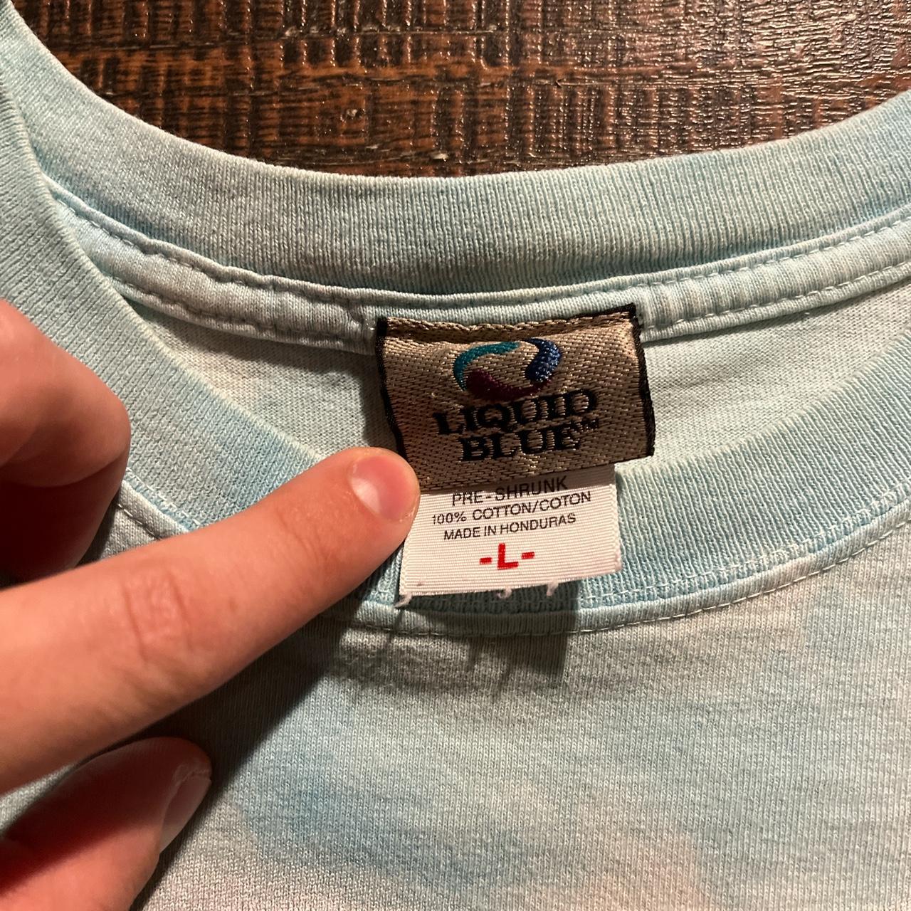 liquid blue Men's Blue T-shirt | Depop