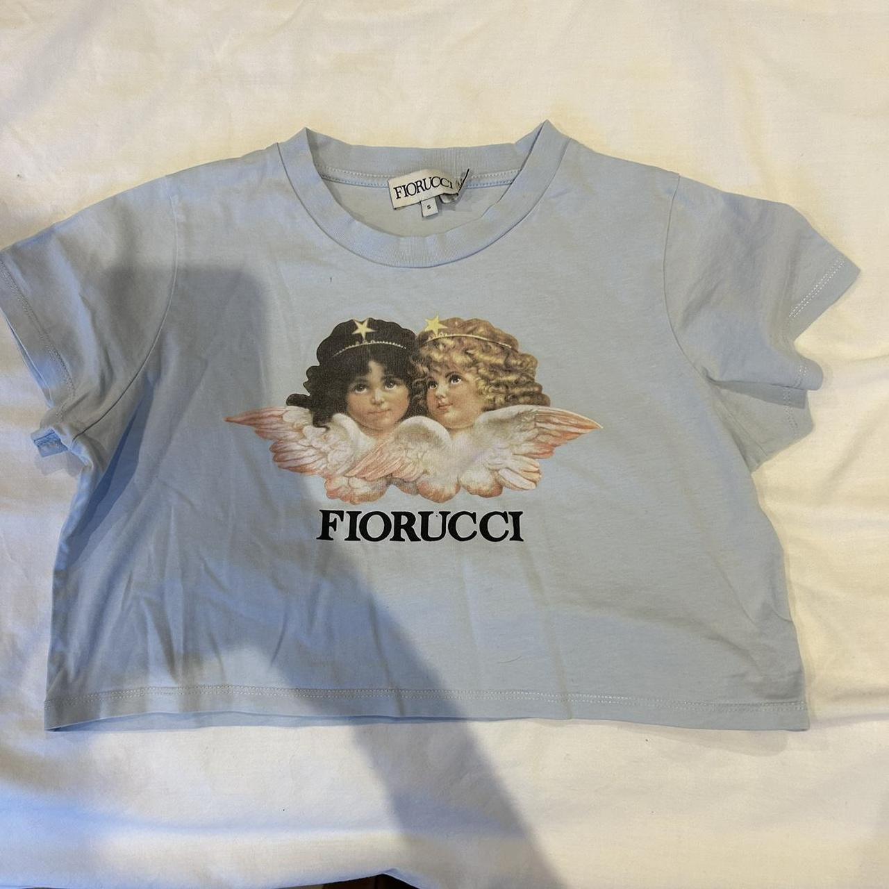 Fiorucci cropped blue t-shirt One small mark shown... - Depop