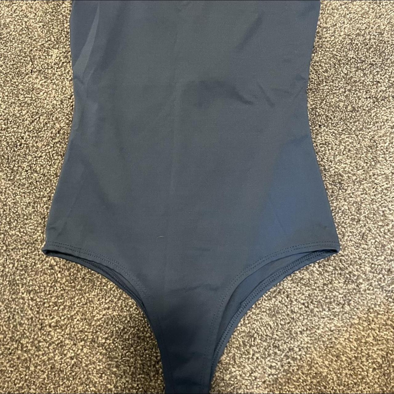 Really cute navy blue body suit. The material is... - Depop